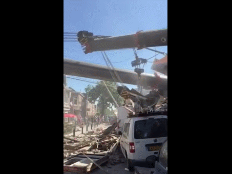 WATCH: At least 20 people injured after cranes collapse on to houses